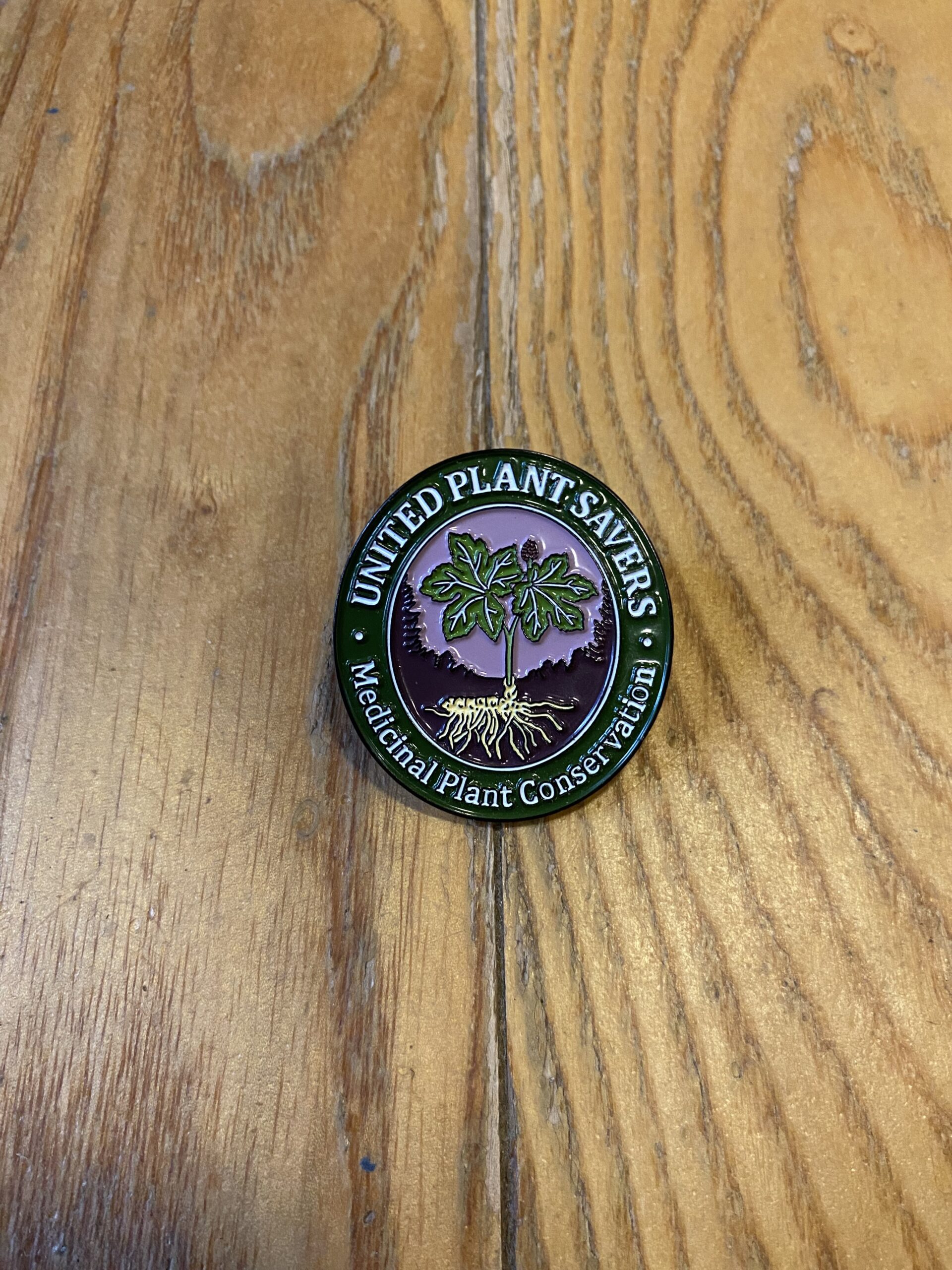 UpS logo Pin front - United Plant Savers
